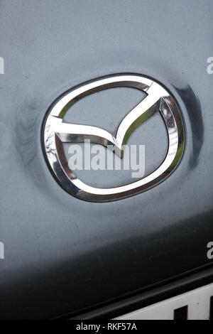 Mazda car symbol and logo, UK Stock Photo - Alamy