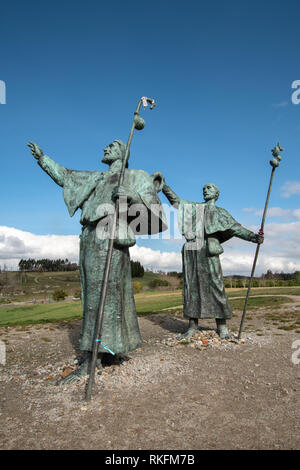 Statues of Pilgrims looking at the cathedral on Monte do Gozo in ...