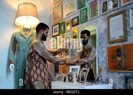 Rahemur Rahman with his installation Made in Bangladesh, at a photo ...