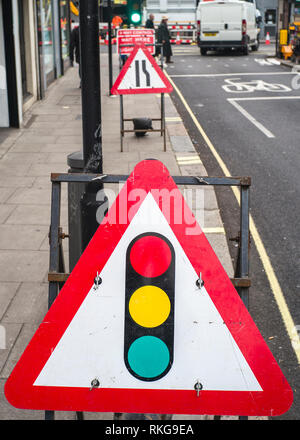 Temporary traffic lights at roadworks on a road in the UK Stock Photo ...