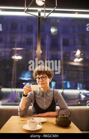 happy young business woman relaxing and geting insiration while working ...