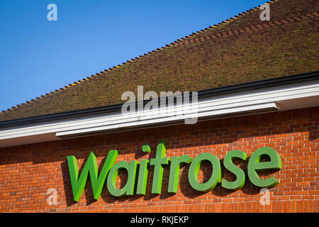 Waitrose supermarket logo on shopfront in Henley-on-Thames, Oxfordshire ...