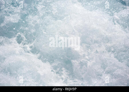 Churned up seawater, overhead and close-up Stock Photo - Alamy