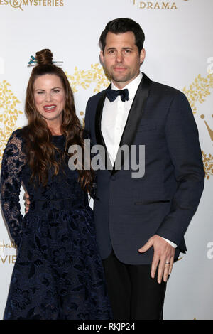 Julianne Morris Polaha and Kristoffer Polaha with their sons Stock ...