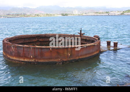 The gun turret of the USS Arizona battleship sits at the surface of the ...