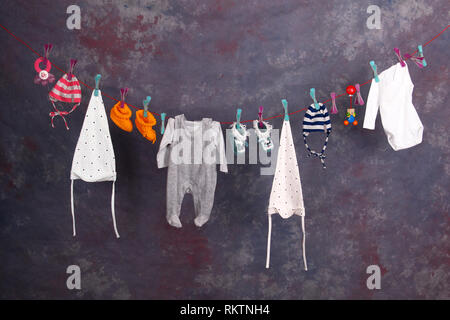 Children's shoes dry on a wash line outside a shack home in Botleng ...