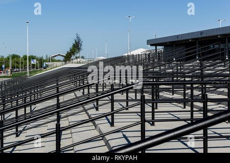 black metal railing for the fans queue on the way to the stadium Stock ...