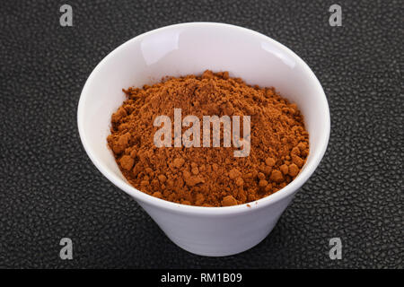 Cocoa powder in the bowl - ready for cooking Stock Photo - Alamy