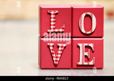 The word love made out of wooden blocks Stock Photo - Alamy