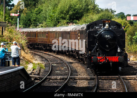 Steam tank engine British railways livery pulling passenger train ...