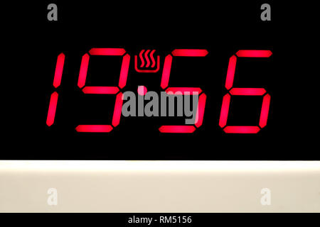 Control panel with red digits on electronic timer display, buttons and ...