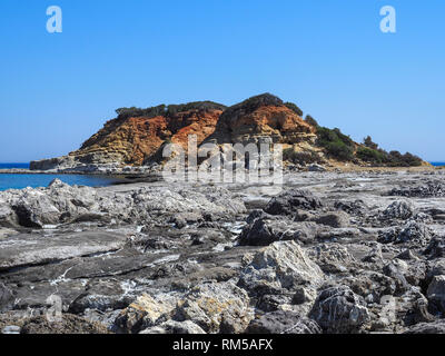 Wonderful beauty wild beach with stony rocky shore, shallow sea water ...