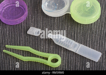 Contact lenses and artificial tear eye drops with tweezers and case ...