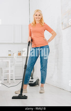 Woman cleaning house Stock Photo - Alamy
