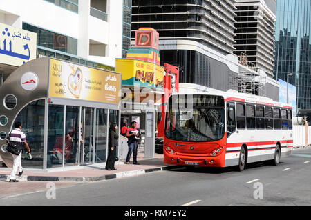 A bus approaching an air-condition bus stop in Dubai in the United Arab ...