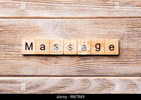 MASSAGE text written on a wooden board. Copy space Stock Photo - Alamy