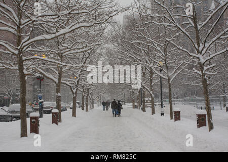 Pedestrians walk through a snow storm on Boxing Day in Toronto, on ...