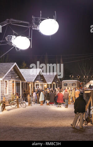 Filming a crowd scene at night with artificial lighting Stock Photo - Alamy