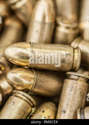 Pile of pistol bullets, close-up, background Stock Photo - Alamy