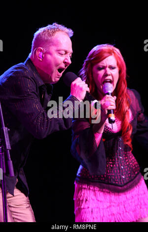B-52's singer Kate Pierson is shown performing during a concert ...