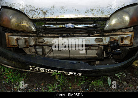 Old rusty broken down junk trucks Stock Photo - Alamy