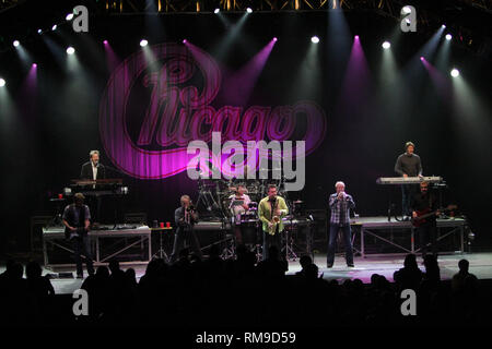Chicago band members are shown performing on stage during a "live ...