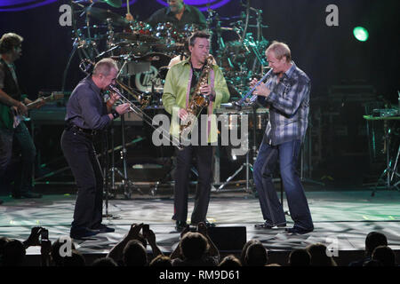 Chicago band members are shown performing on stage during a "live ...