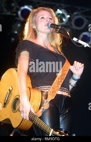 Jewel is shown performing on stage during her concert performance at ...