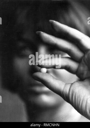 birth control pills of woman not want to have baby with purple flowers ...