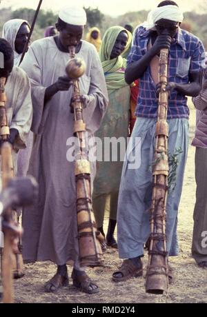 Sudanese musicians with wind instruments Stock Photo - Alamy