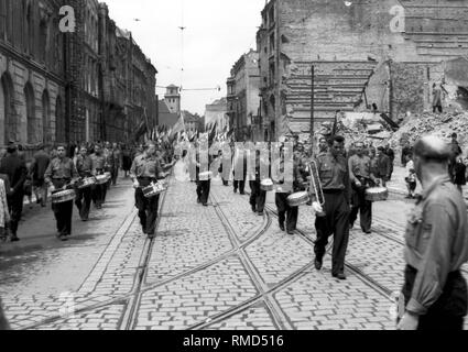 FDJ rally through the city of East Berlin, which was destroyed by the ...