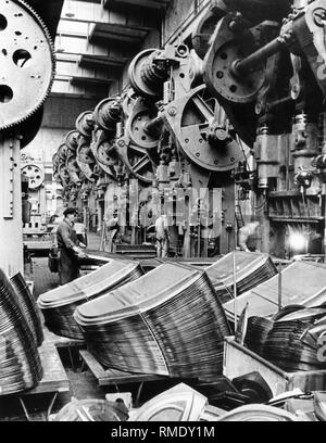 Workers of the Volkswagen factory in Wolfsburg welcome Adolf Hitler ...