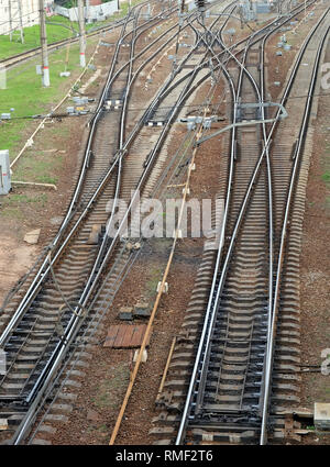 vertical view of many railway tracks in sunny day Stock Photo - Alamy