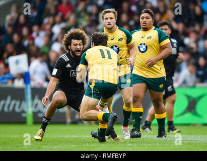 Australia wing Liam McNamara runs at New Zealand wing Caleb Makene ...