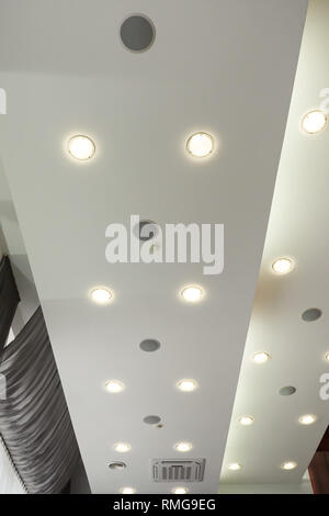 Modern layered ceiling with embedded lights and stretched ceiling inlay ...