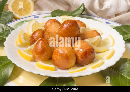 Typical neapolitan dessert called baba and lemon caprese cake Stock ...