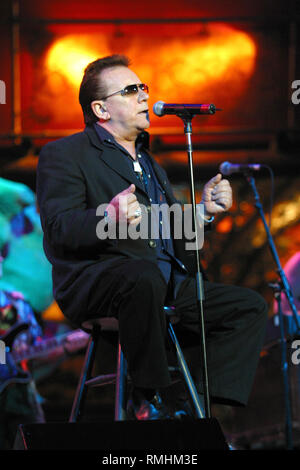 Singer & songwriter Eric Burden is shown performing on stage with the ...