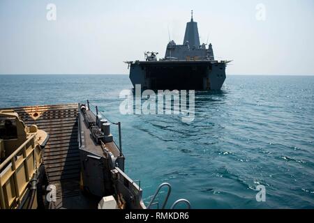 Landing craft utility (LCU) 1651 approaches amphibious transport dock ...