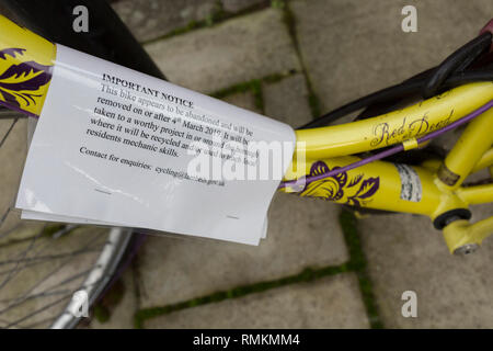 Council warning notice on bicycle about removal Stock Photo - Alamy