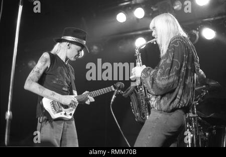 Brothers Johnny and Edgar WInter are shown performing on stage during a ...