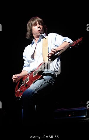 Guitarist Pat Travers is shown performing on stage during a "live ...