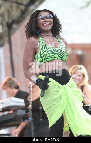 Shannon is shown performing on stage during a "live" concert appearance ...