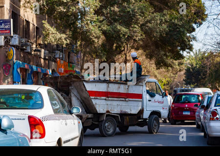 Cairo, Egypt - garbage recycling collector or Zabbaleen on a city ...
