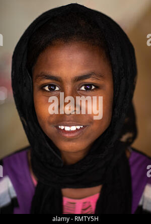 Portrait of a smiling Beja tribe girl, Red Sea State, Port Sudan, Sudan ...