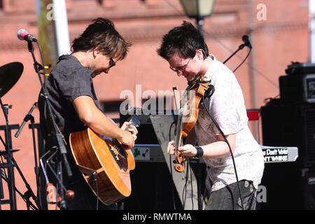 Enter the Haggis band guitarist Trevor Lewington is shown performing on ...