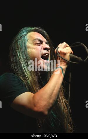 Fates Warning are shown performing on stage during a "live" concert ...
