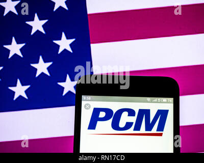 PCM, Inc. direct marketing company logo seen displayed on smart phone ...