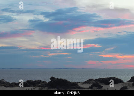 Sunset over Albemarle Sound as viewed by unidentifiable people from ...