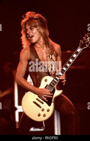 Guitarist Randy Rhoads is shown performing on stage during an Ozzy ...