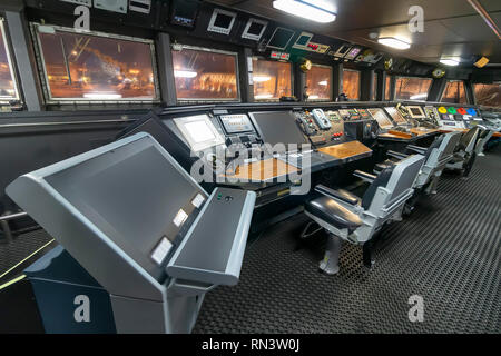 Modern ship control panel with radar screen, accelerator, trackball and ...